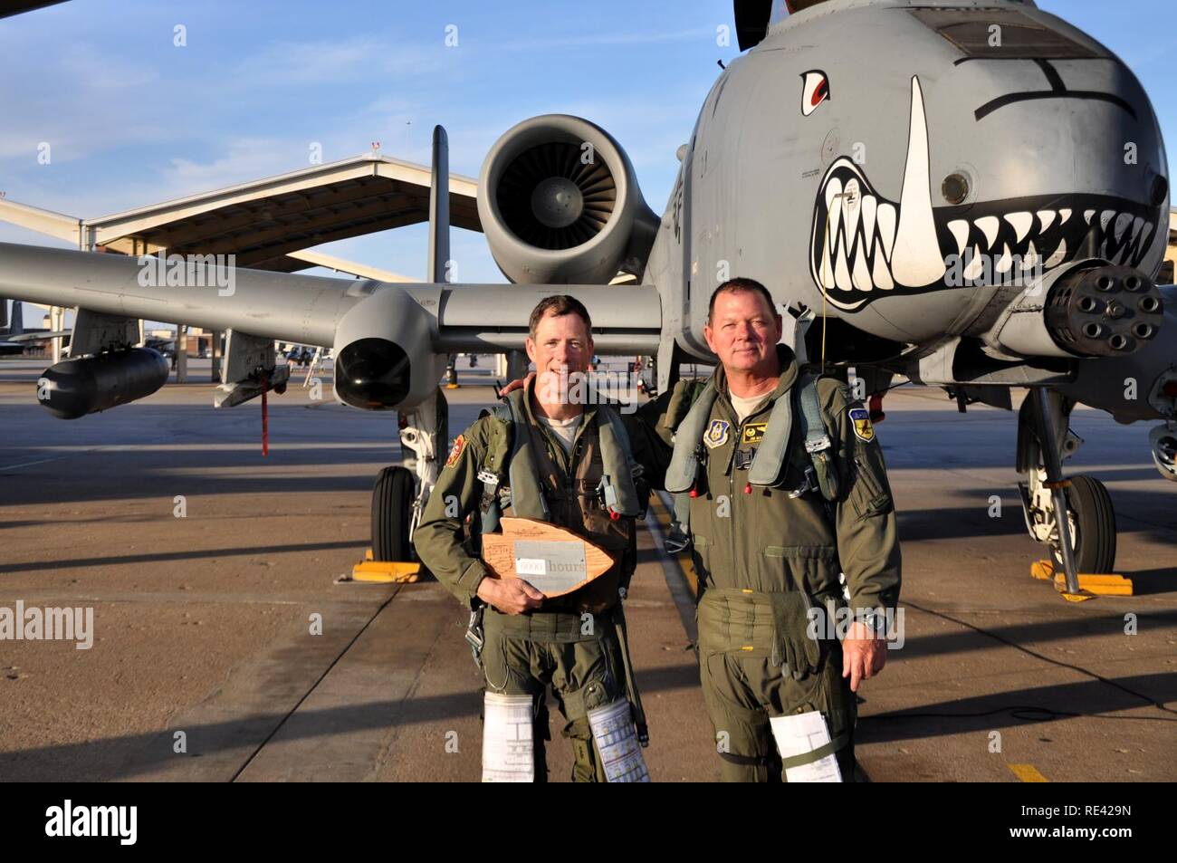 Lt. Col. John Marks, left, a pilot with the 303rd Fighter Squadron ...