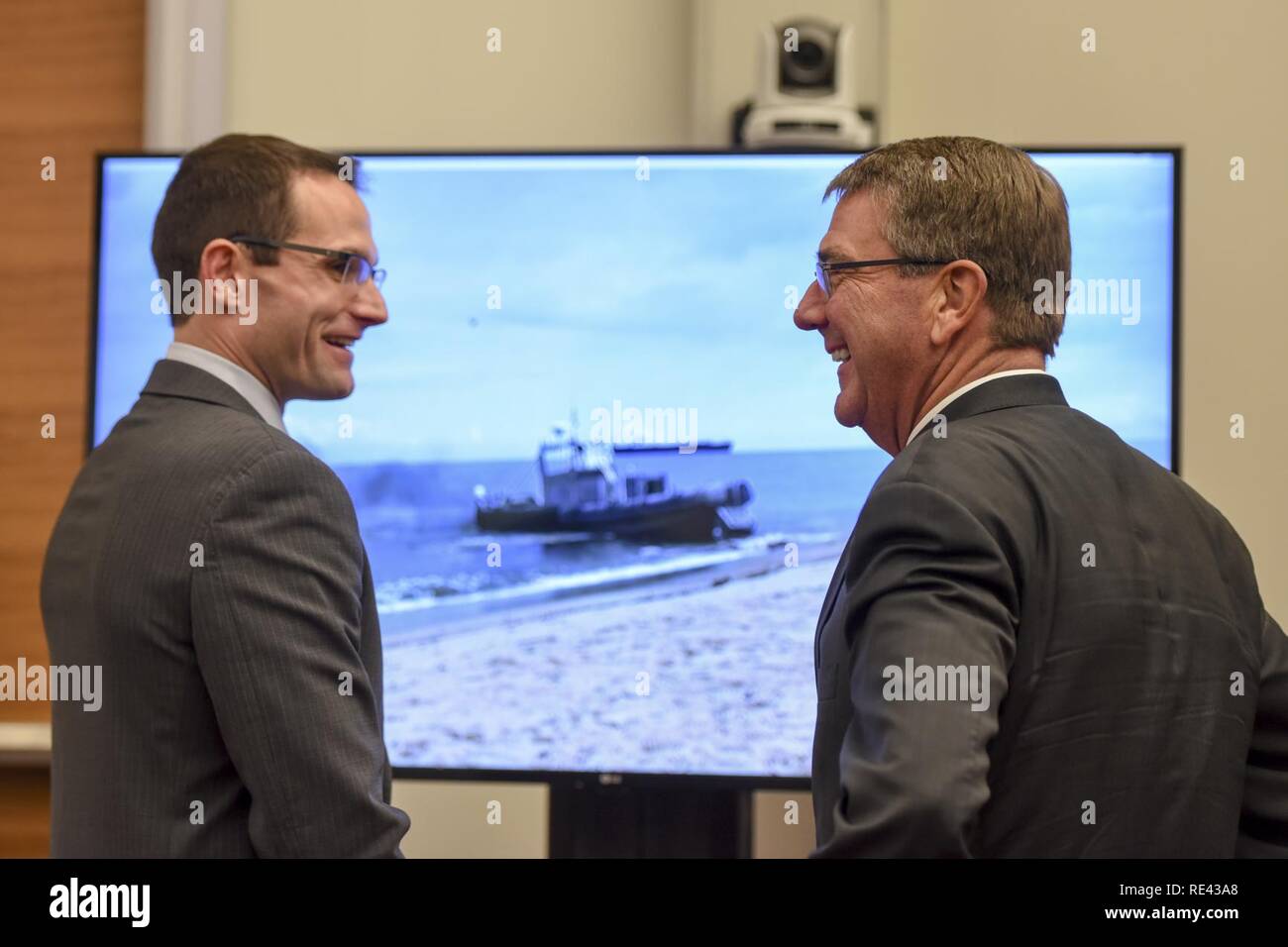 Secretary of Defense Ash Carter speaks with Will Roper, director of the ...