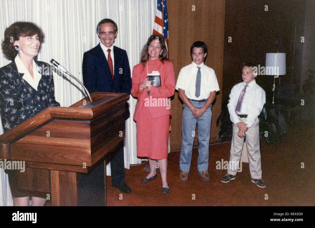 LADY SPEAKING AT PODIUM Stock Photo - Alamy