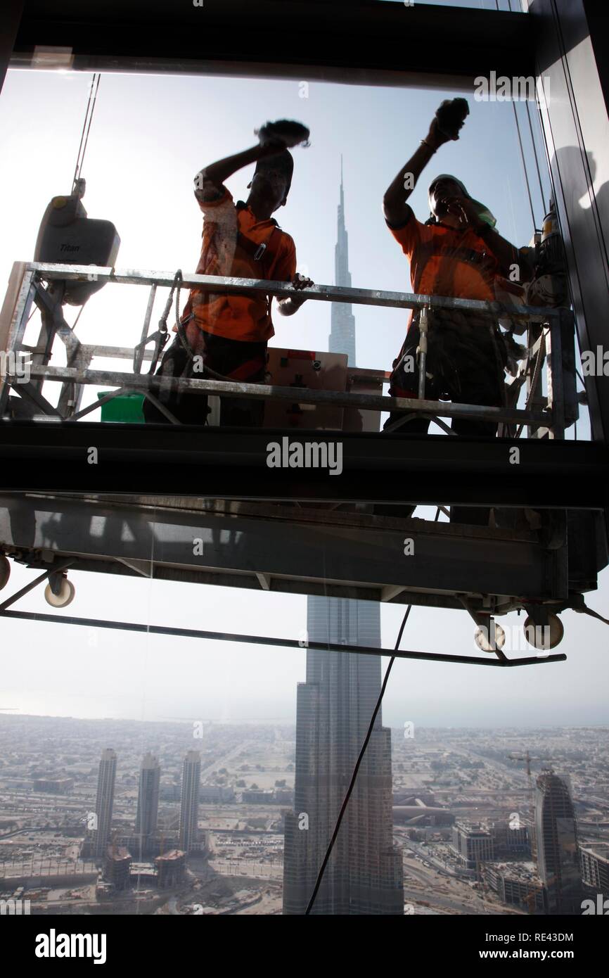 Window cleaner on the 63rd floor of the luxury hotel The Address, Neos ...