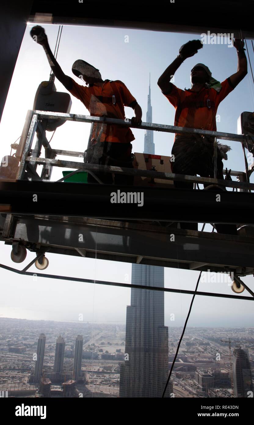 Window cleaner on the 63rd floor of the luxury hotel The Address, Neos ...