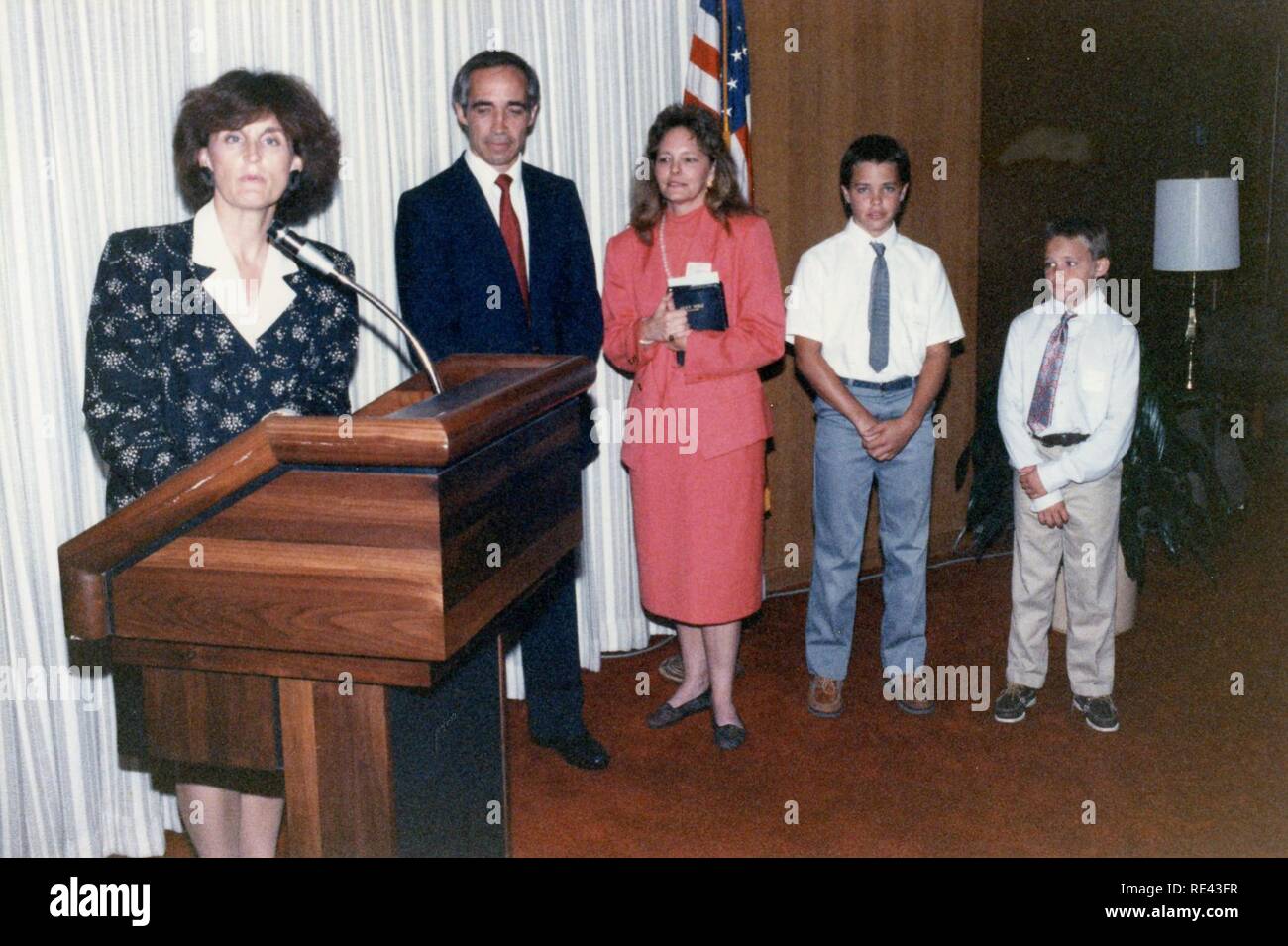 LADY SPEAKING AT PODIUM Stock Photo - Alamy