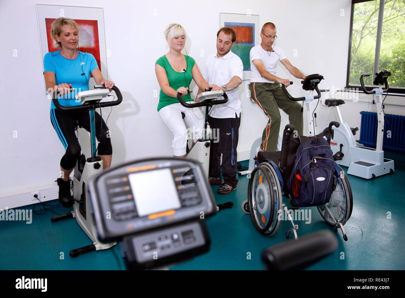 Patients during cardiovascular training with heart rate and pulse rate ...