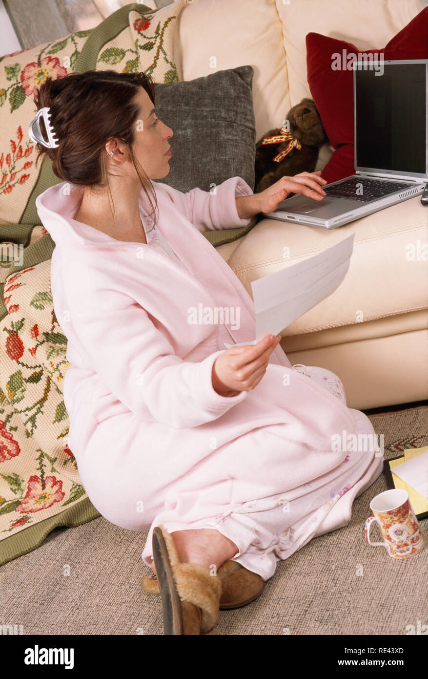 Working in pyjamas hi-res stock photography and images - Alamy