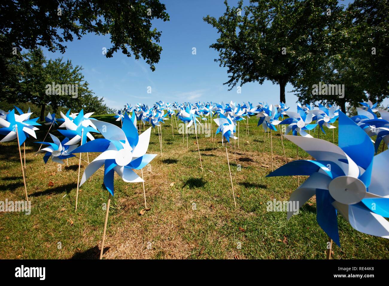 Blue and white plastic wind wheels as decoration on a lawn Stock Photo ...