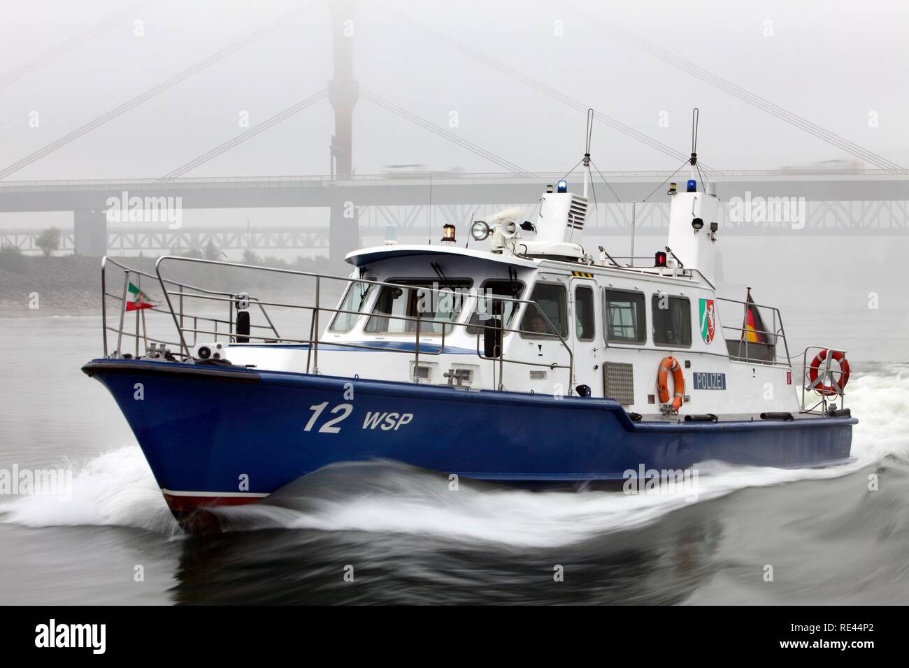 Boat of the water police patrolling on the Rhine river at Duisburg ...