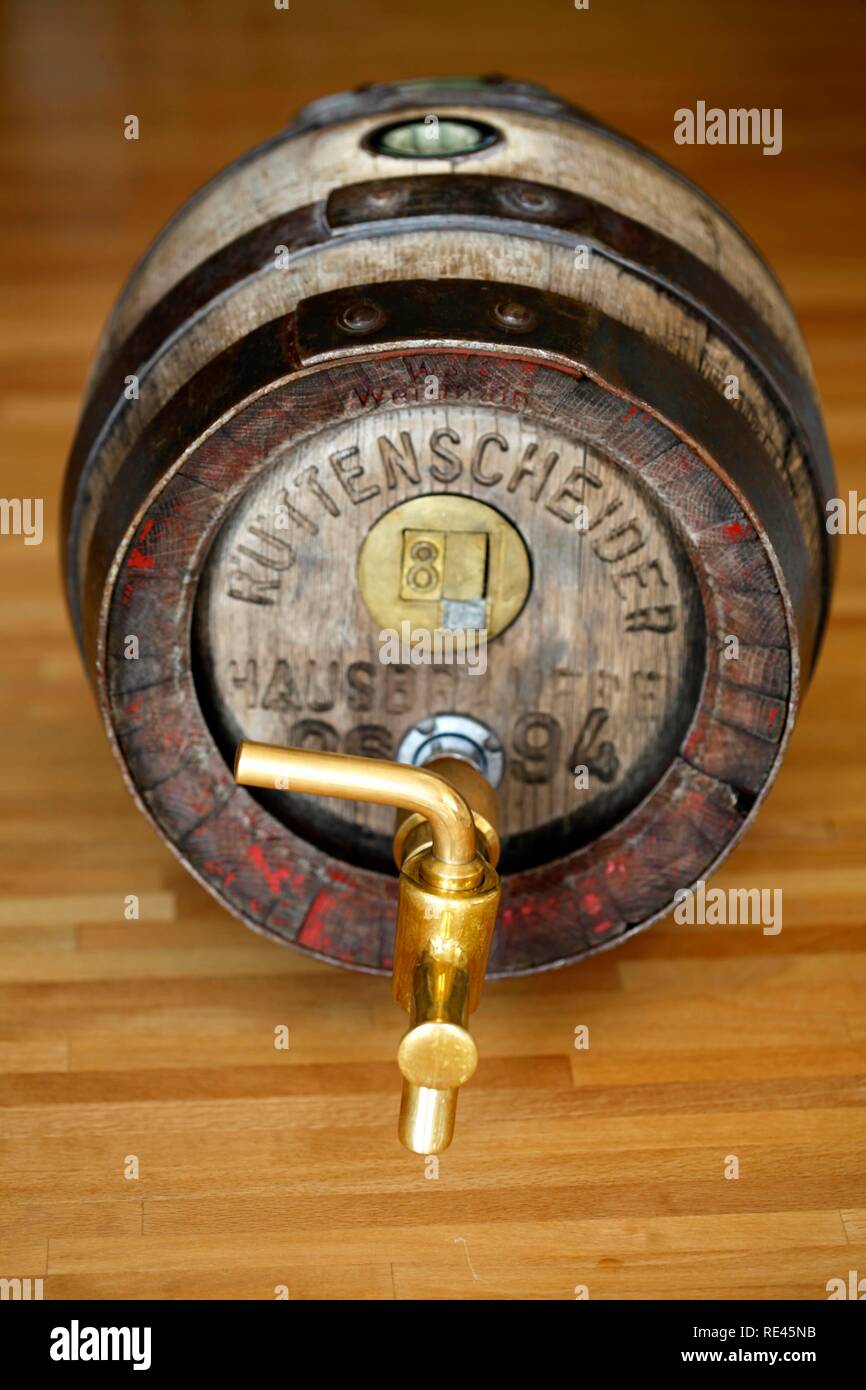 Wood beer keg in a small private brewery, with brass tap Stock Photo ...