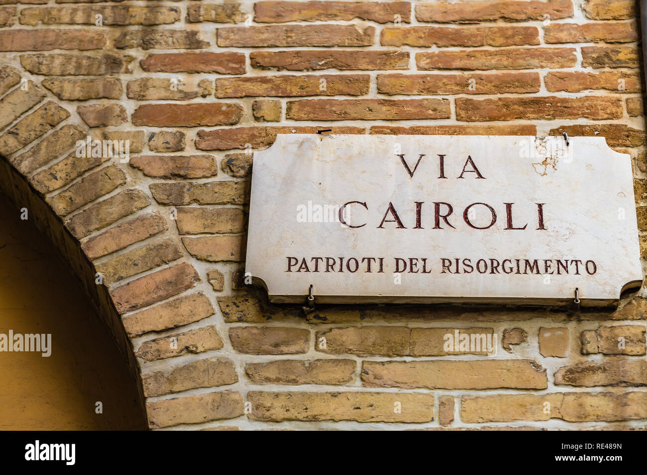 RAVENNA, ITALY - JANUARY 15, 2019: light is enlightening street name ...