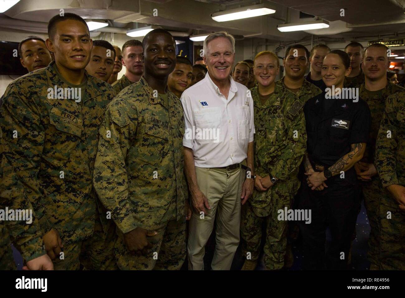 USS MAKIN ISLAND, Singapore (November 22, 2016) Marines and Sailors ...