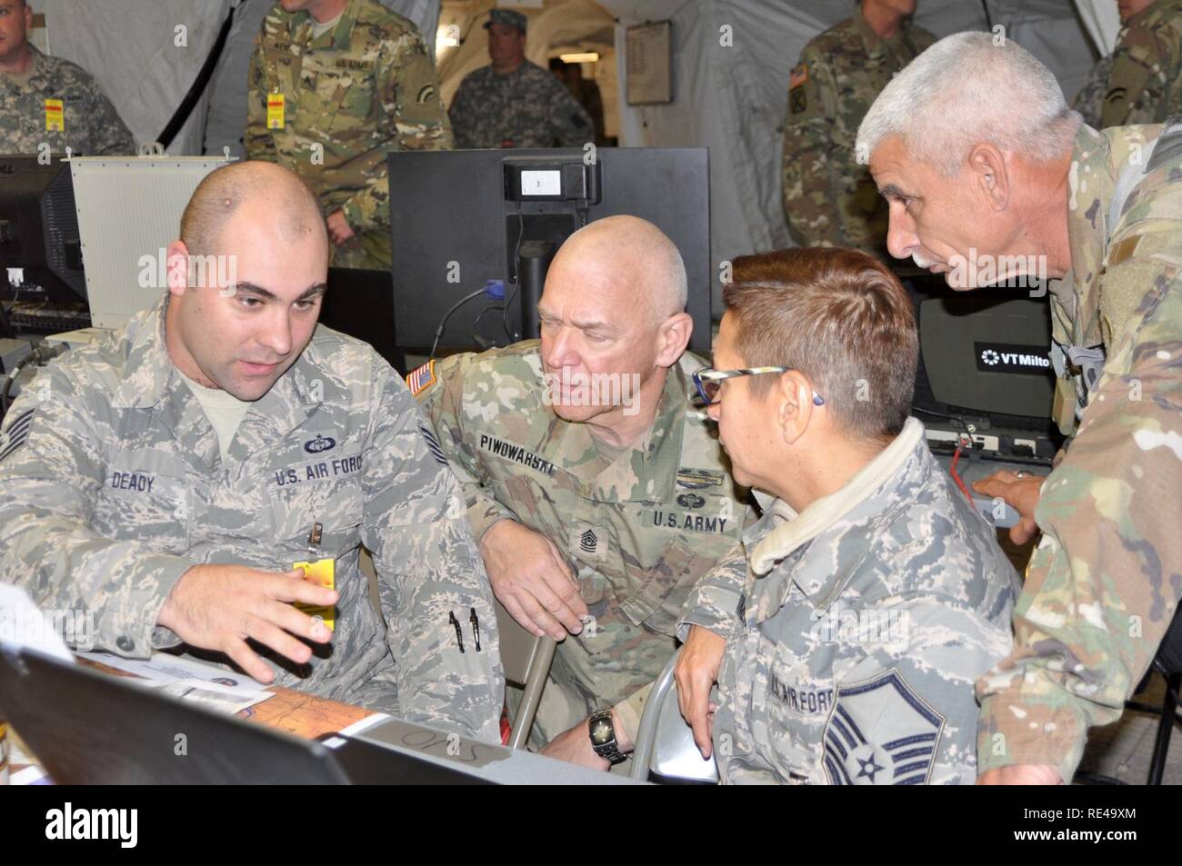 Massachusetts Air National Guard Tech. Sgt. Thomas Deady (left) and ...