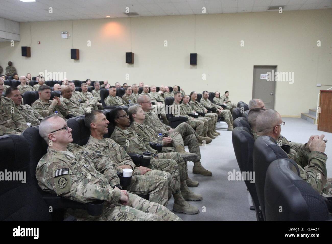 Soldiers of the 451st Expeditionary Sustainment Command attend a town ...