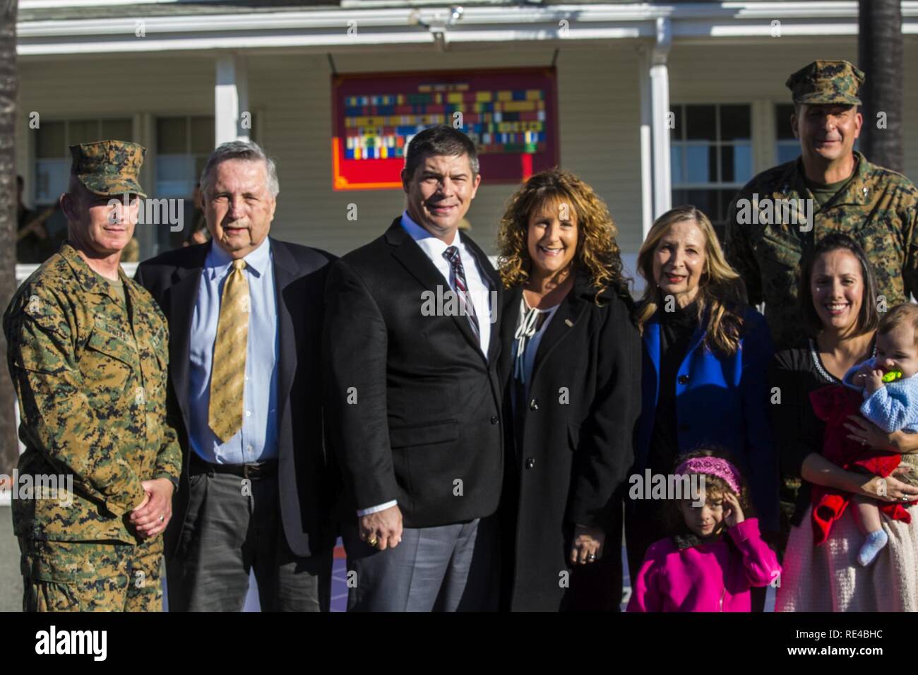 Maxine Russell and her friends and family pose for a photo with Sgt ...