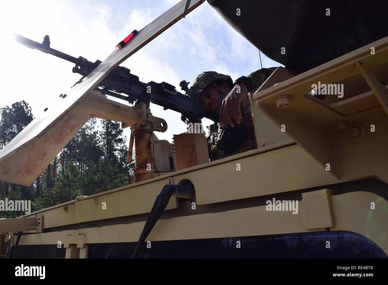 A Soldier from 3rd Brigade Support Battalion scans for targets during ...