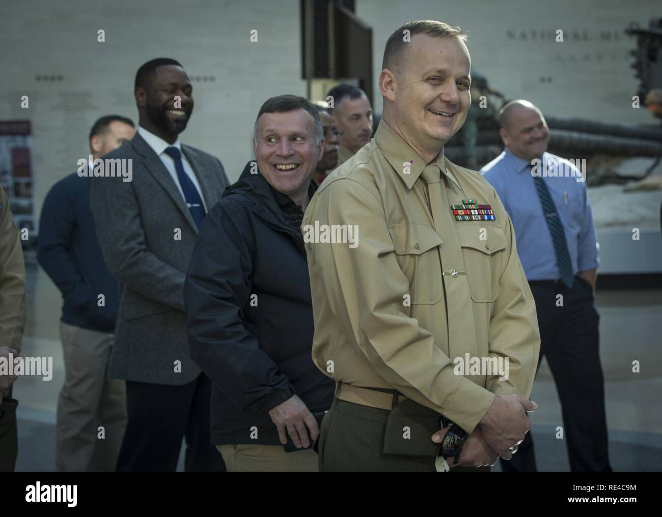 An attendee laughs during a speech given by U.S. Marine Corps Chief ...