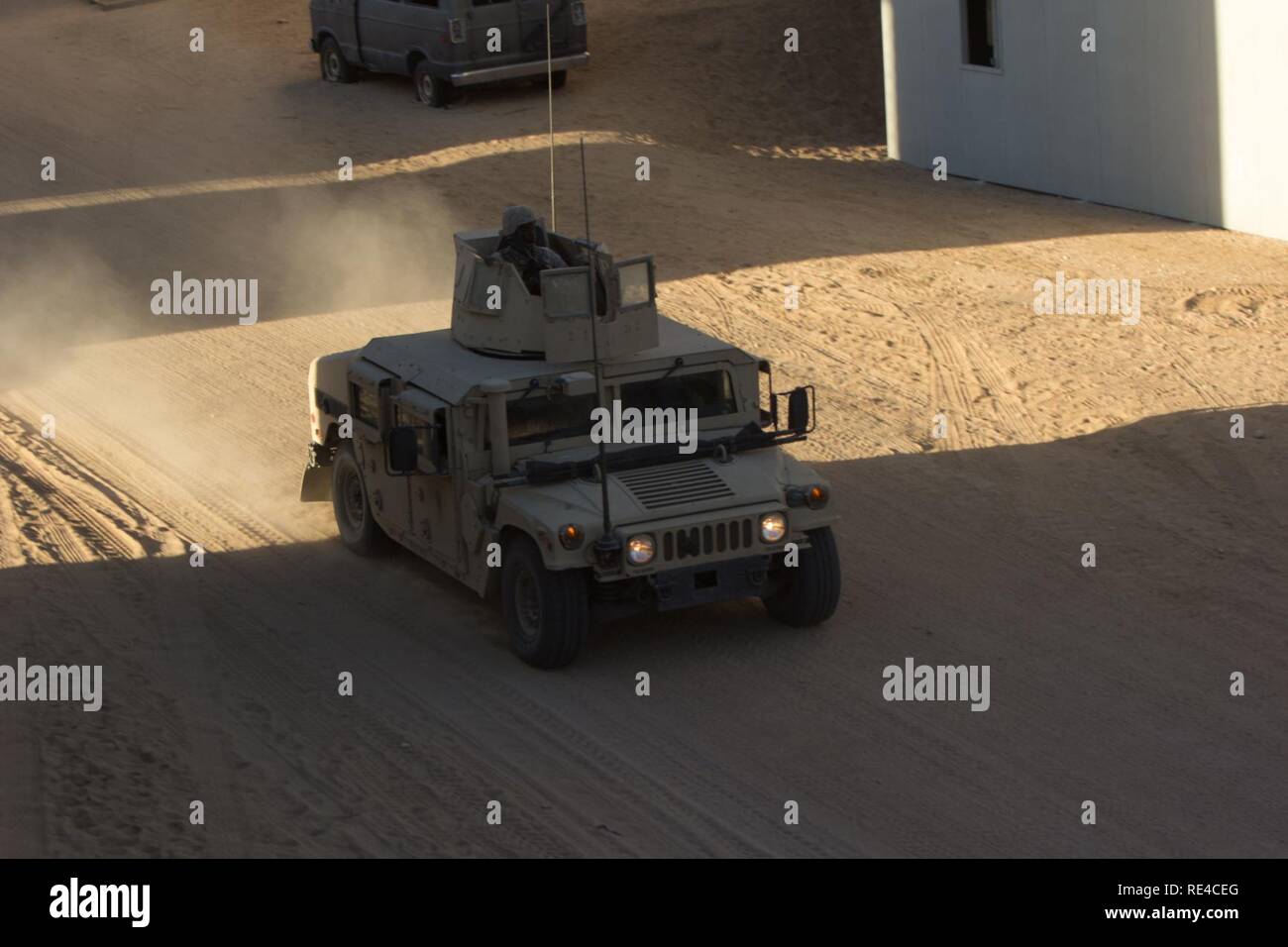A High Mobility Multipurpose Wheeled Vehicle (Humvee) patrols during ...