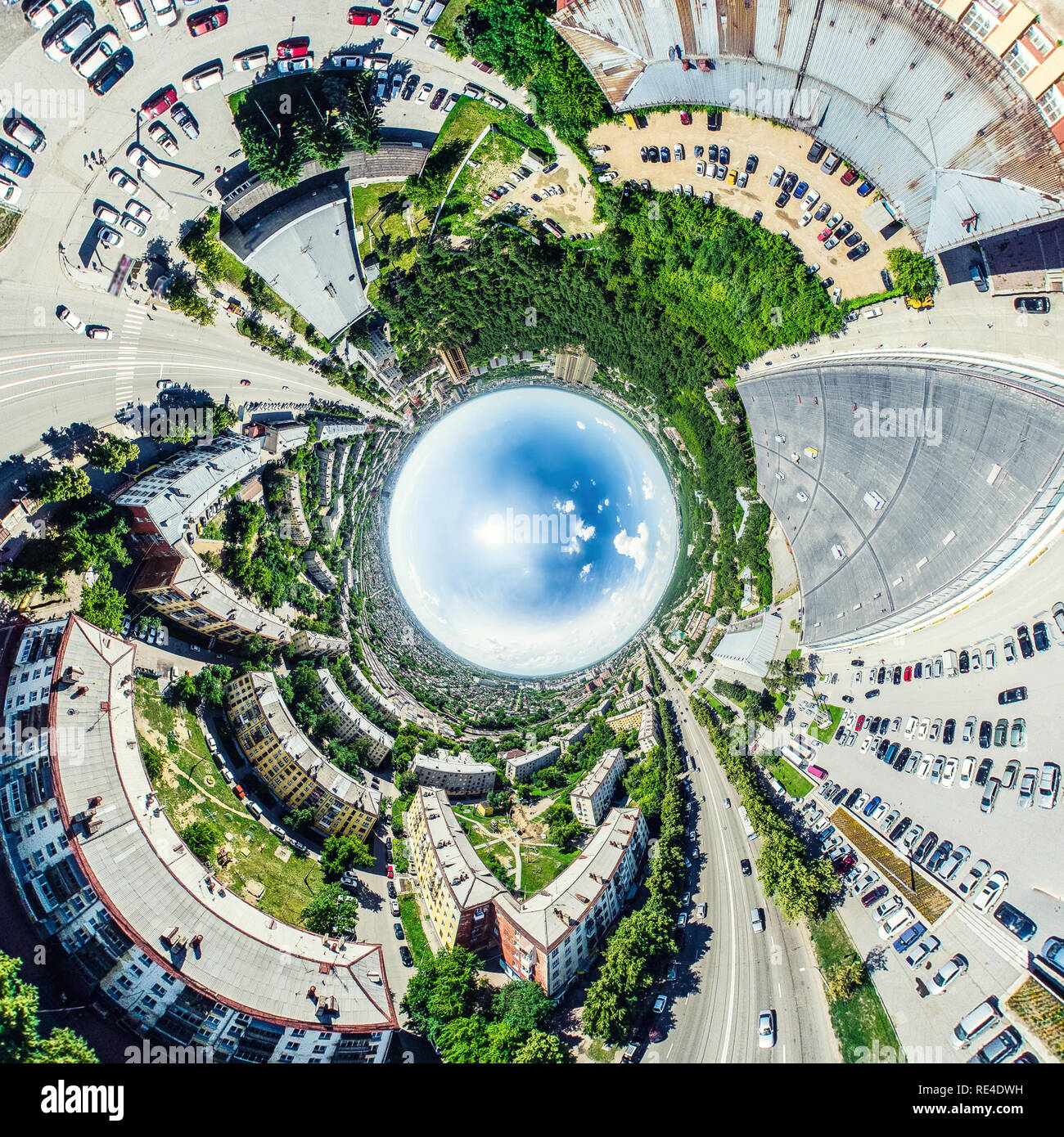 Aerial city view with crossroads and roads, houses, buildings, parks ...