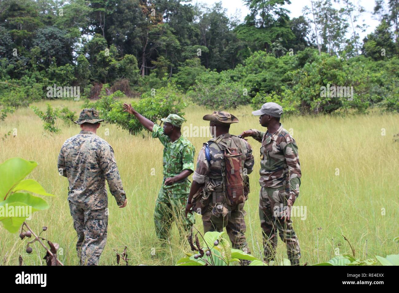 A U.S. Marine, left, oversees a member of the Gabonese Agency for ...