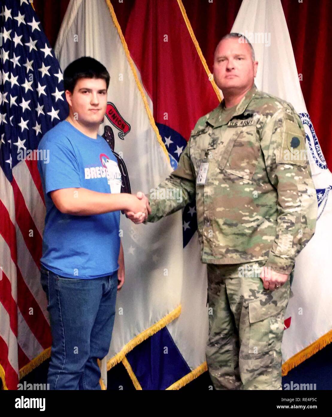 Pvt. Cody Wheat, of Greenville, Illinois, shakes hands with Sgt. 1st ...