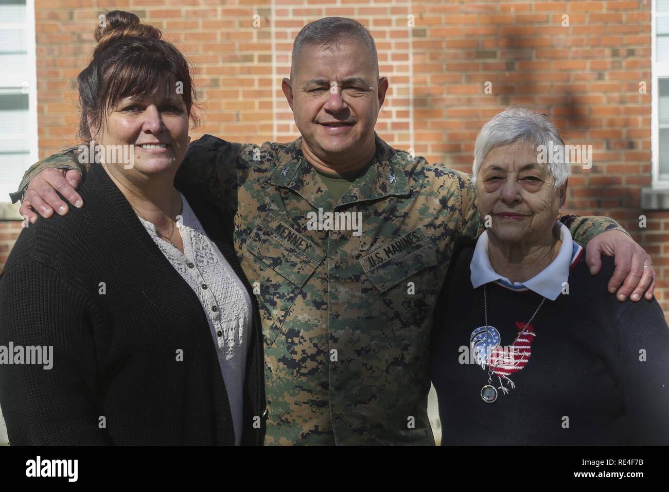 Col. Jeffrey J. Kenney, center, poses for a photo with his wife Lori ...