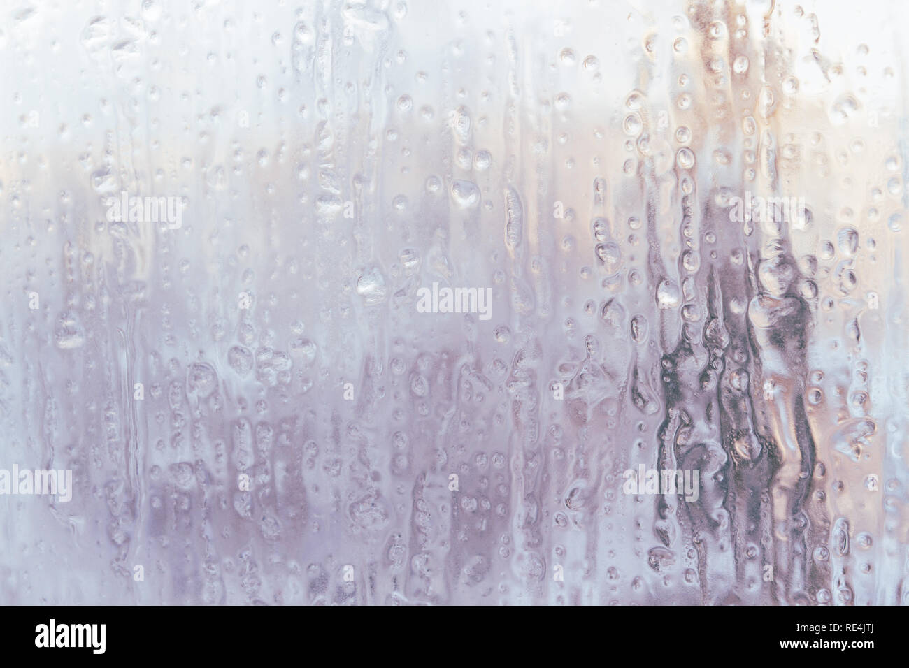 Frozen window in winter with drops and drips Stock Photo - Alamy