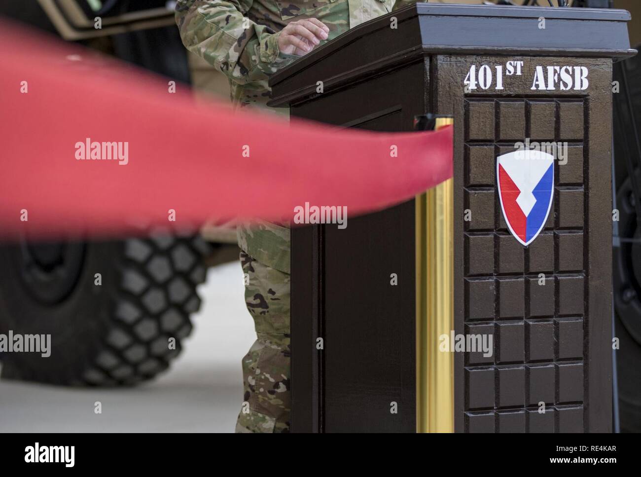 A red ribbon waits to be cut during the celebration of the completion ...