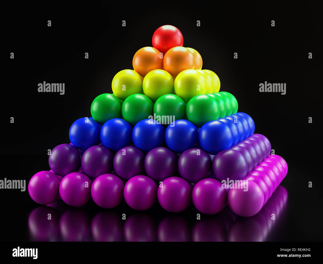 3D render of pyramid formed from balls in rainbow colors on black ...