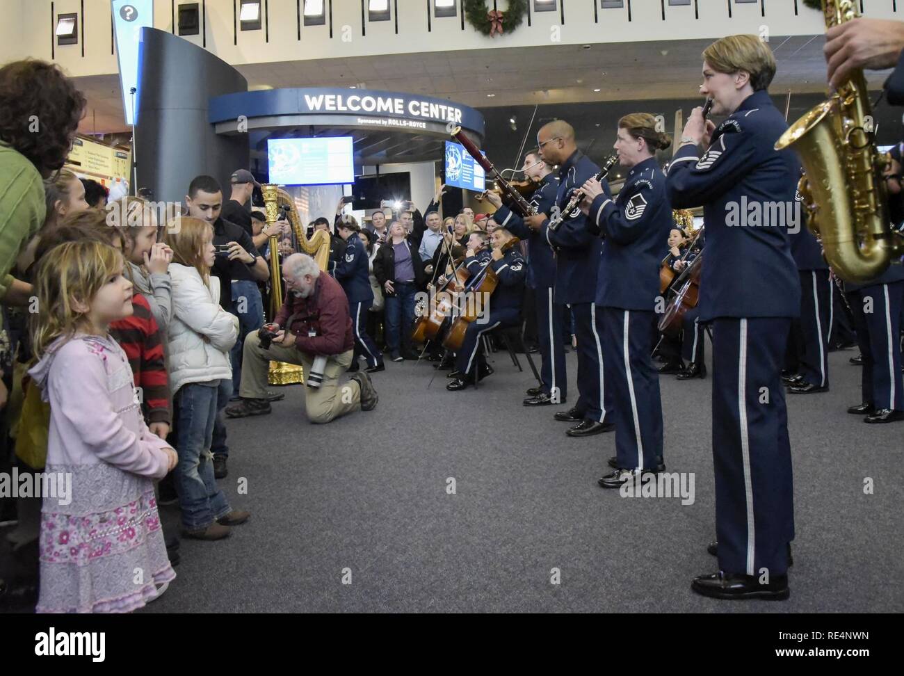 Museum visitors look on as U.S. Air Force Band members kick off their ...