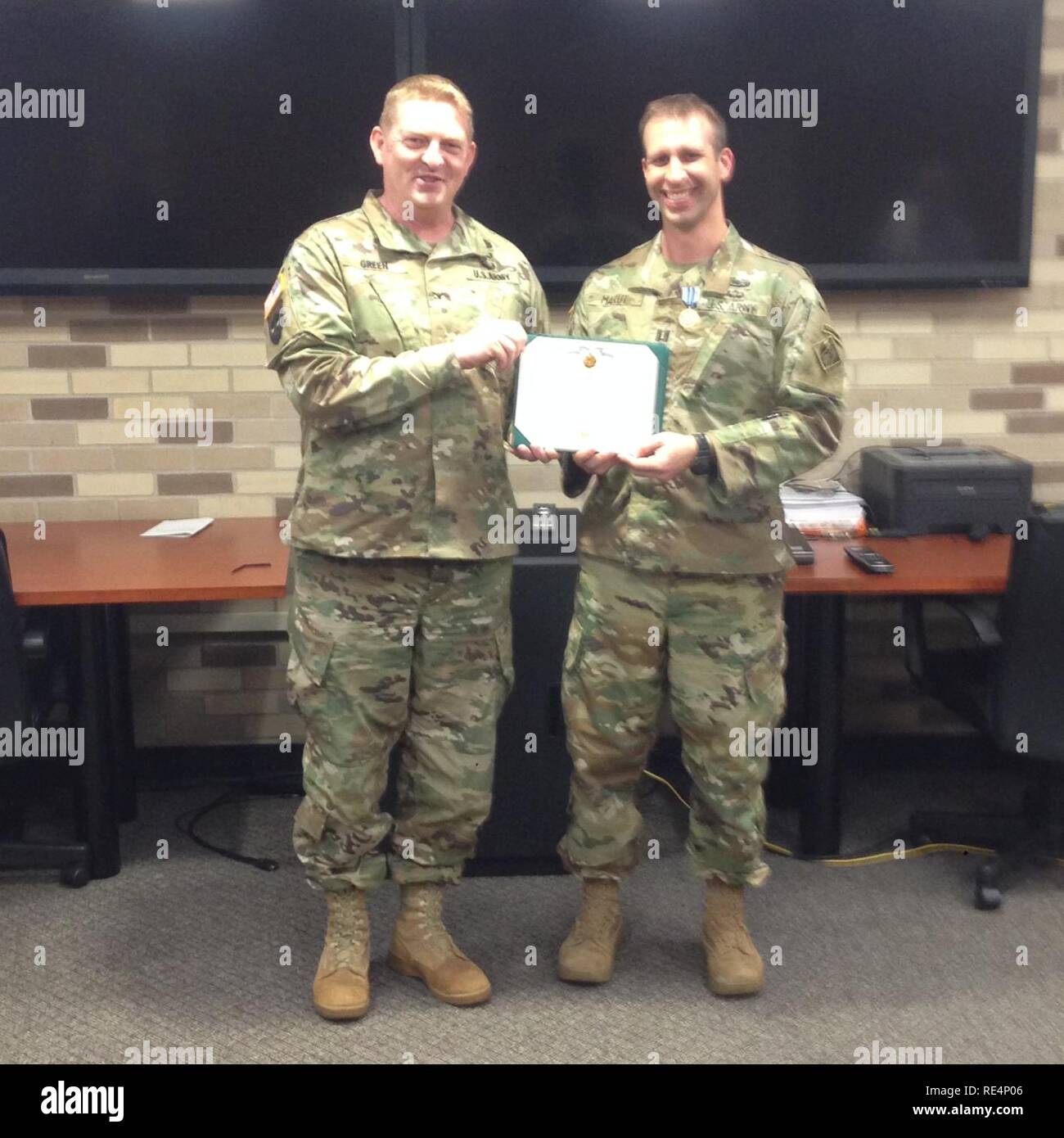 In photo (l to r), ERDC Commander Col. Bryan S. Green presents Capt ...