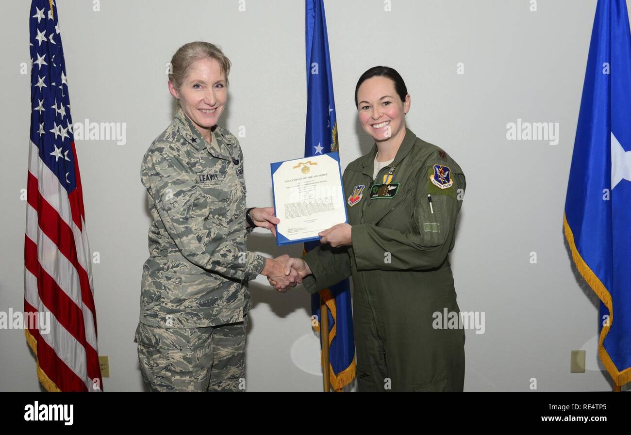 Brig. Gen. Jeannie Leavitt, 57th Wing commander, presents Maj. Annie ...