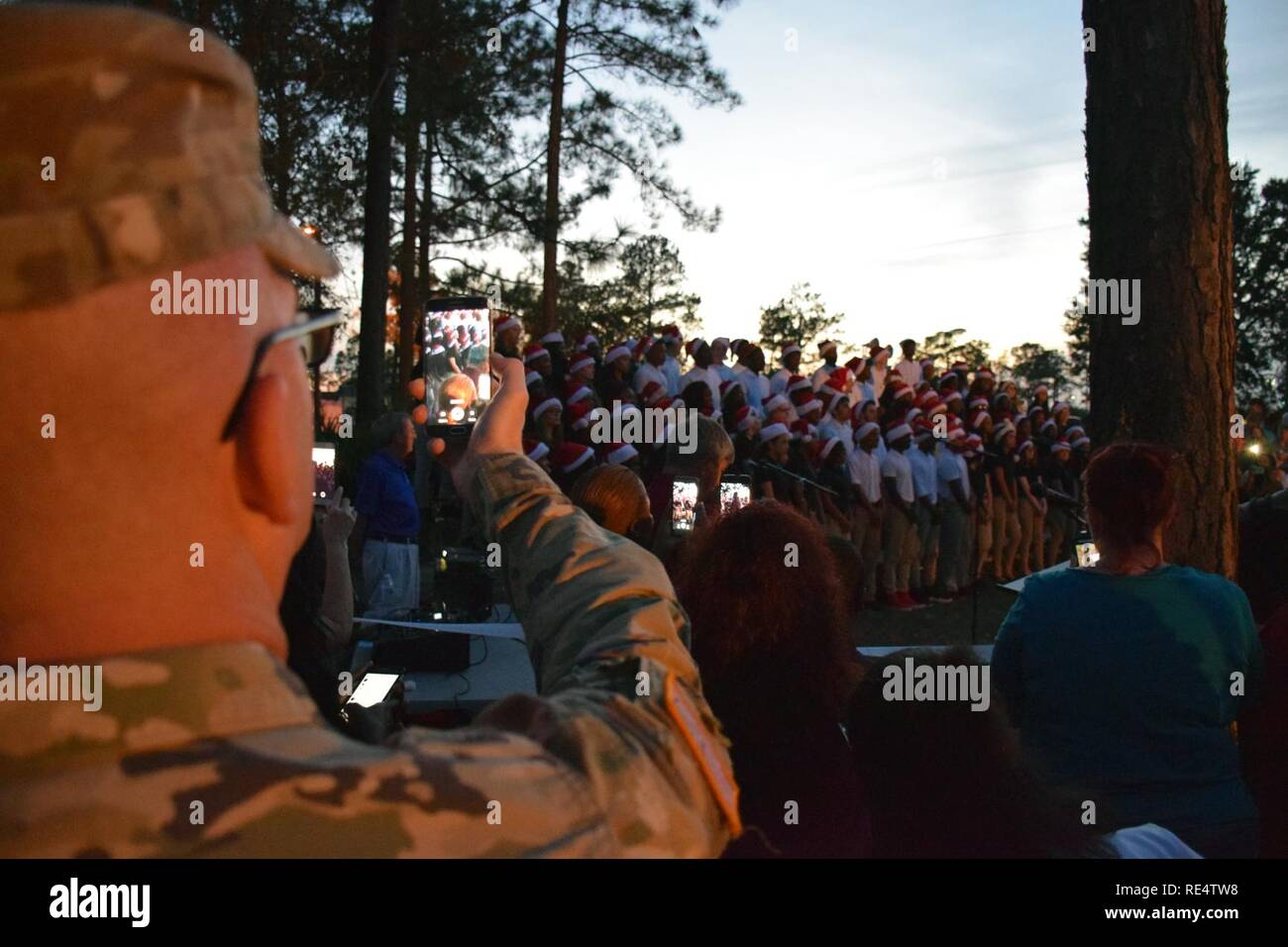 The 3rd Infantry Division Family records the moment as chorus members ...