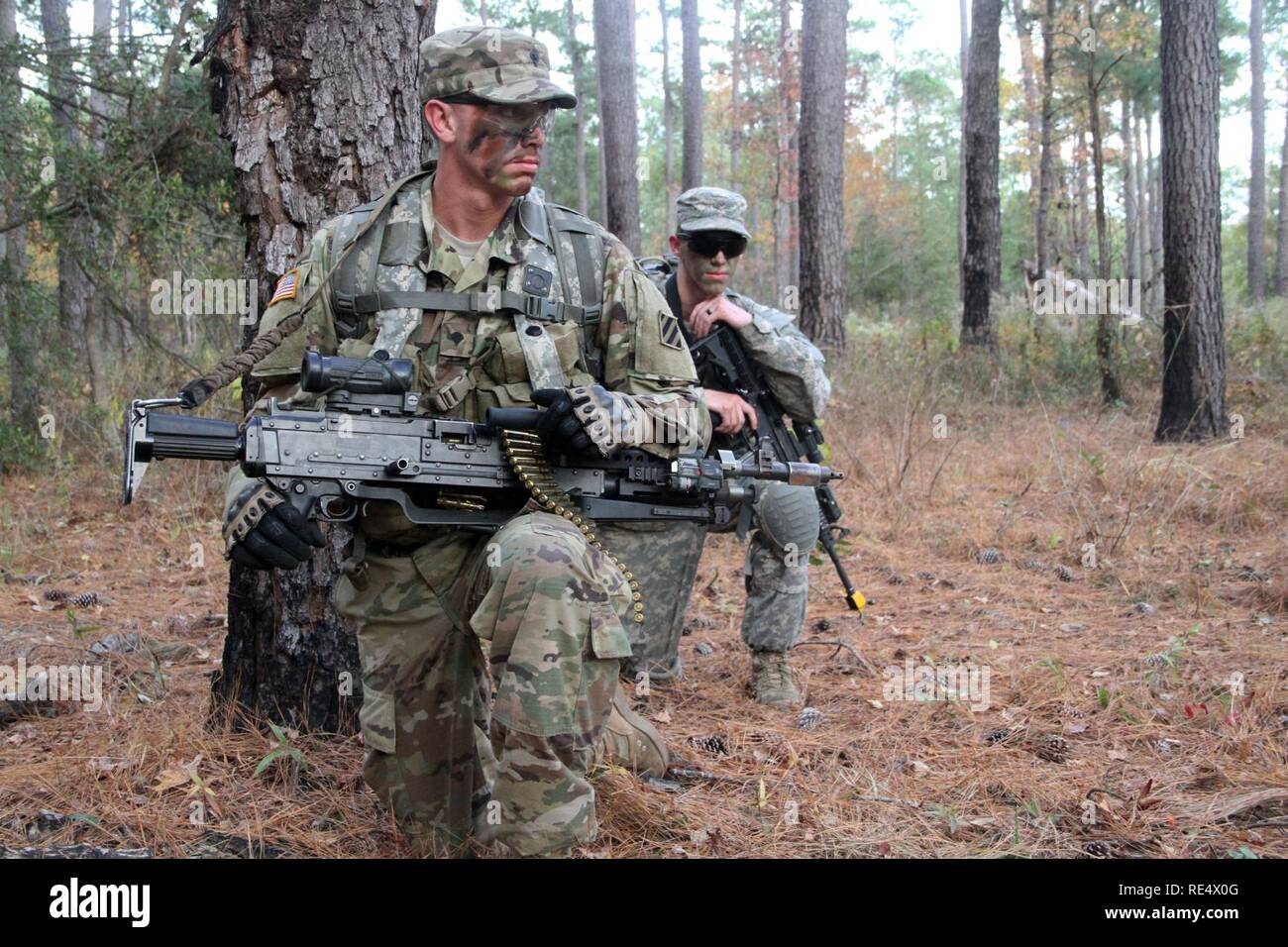 Spc. Brett Bitner (front) an infantryman with Bravo Company, 1st ...