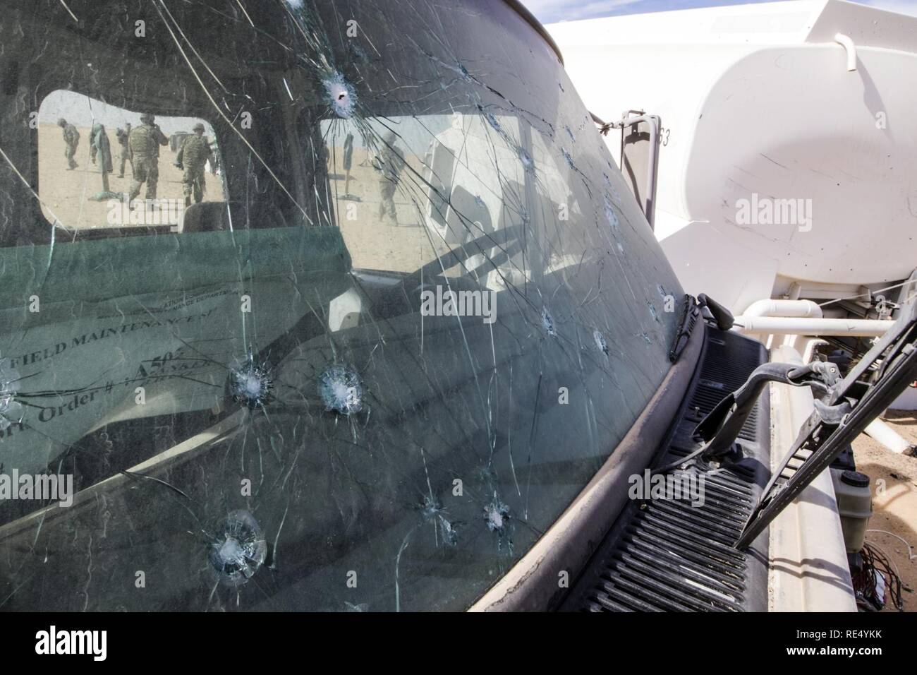 A truck peppered with holes from the tungsten steel pellets from the ...
