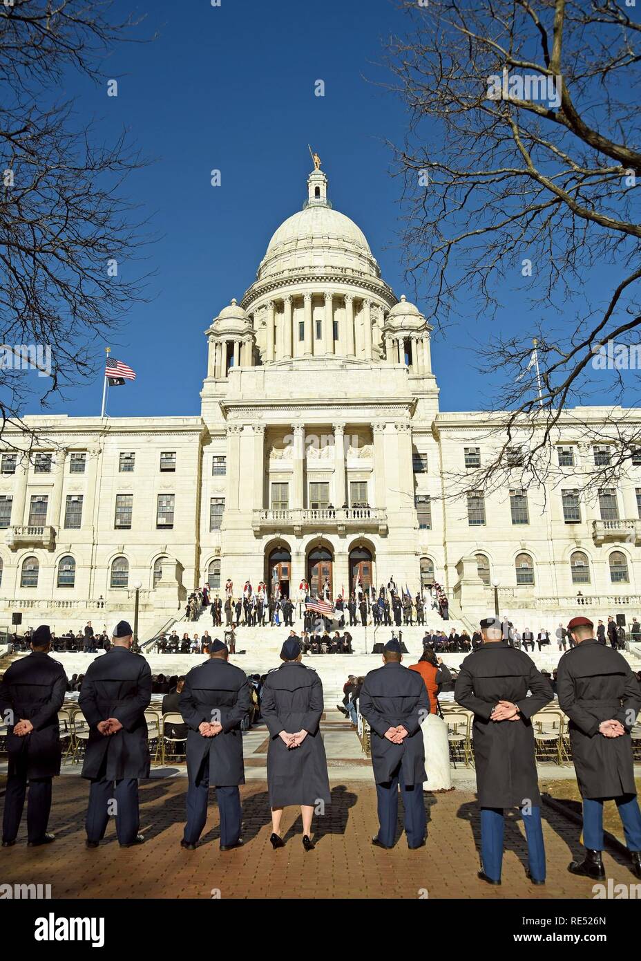 Airmen and Soldiers of the Rhode Island National Guard listen as Rhode ...
