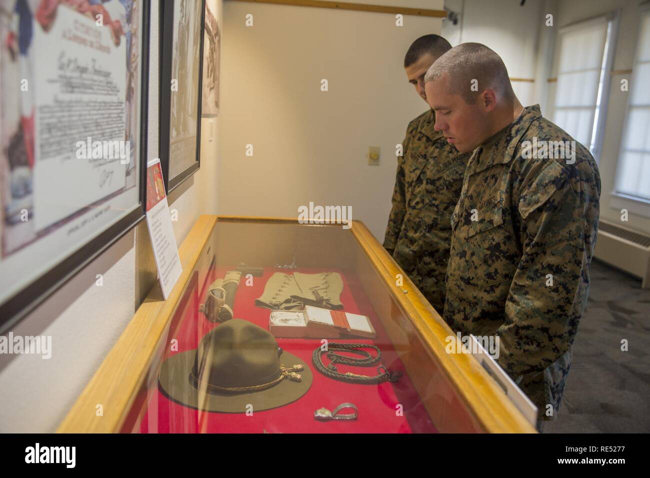New Marines from Delta Company, 1st Recruit Training Battalion, examine ...