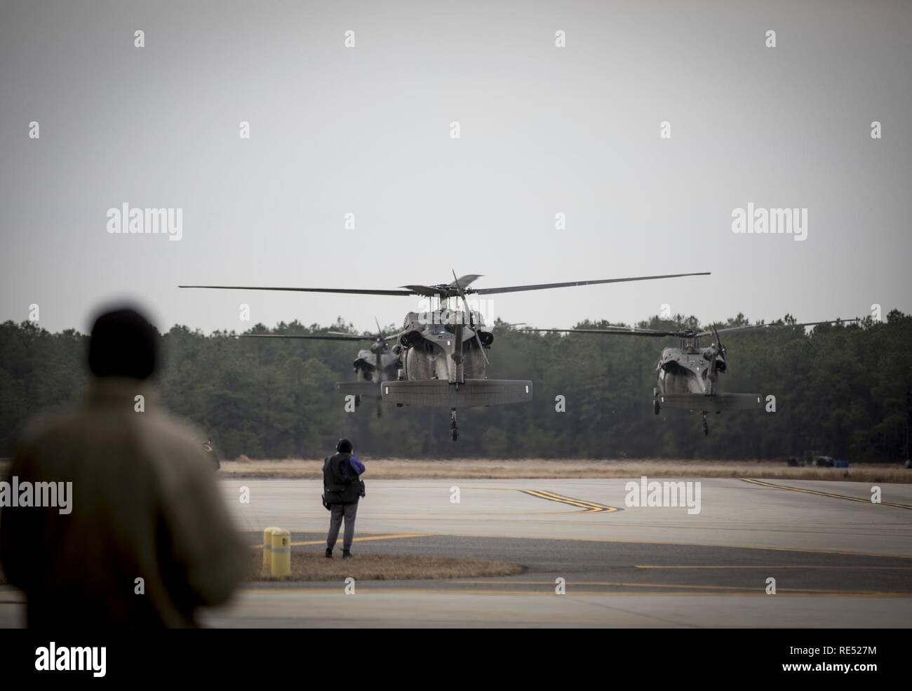 U.S. Army Chief Warrant Officer 3 Austin Randolph watches as his son ...
