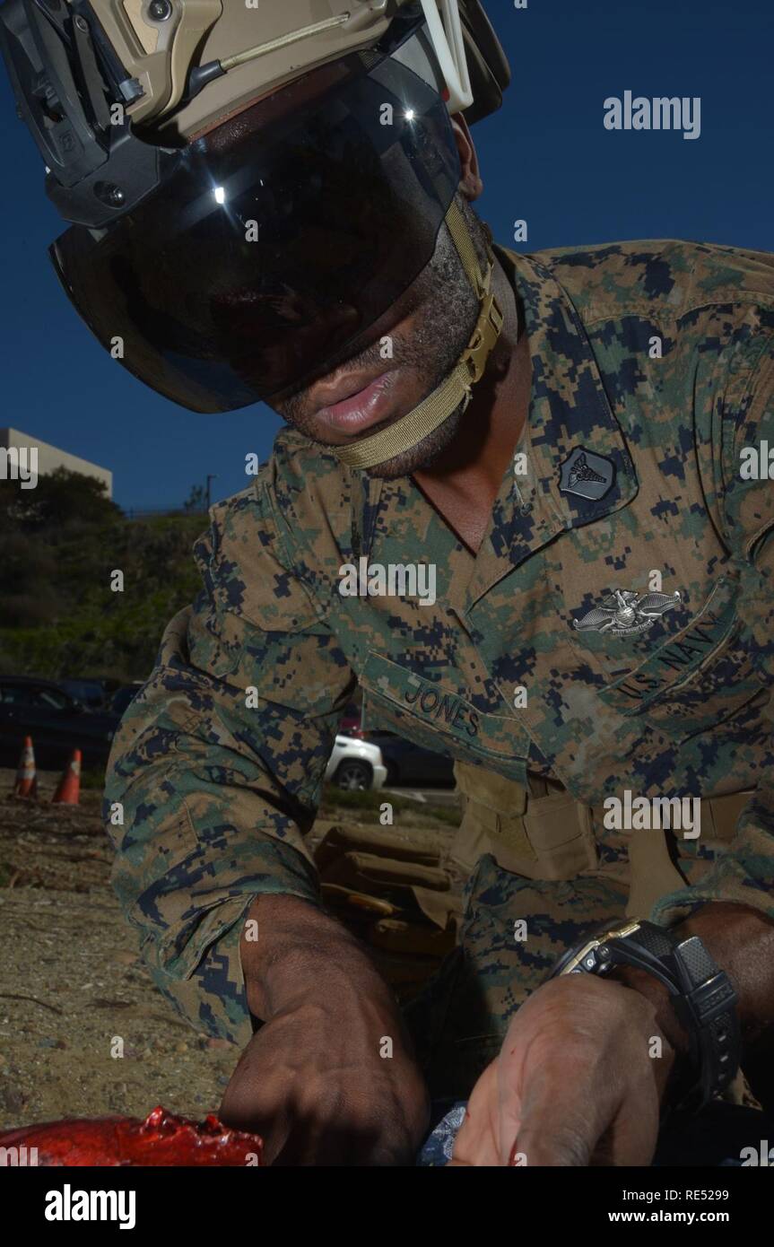 SAN DIEGO-- Hospital Corpsman 2nd Class Eldredge Jones demonstrates ...