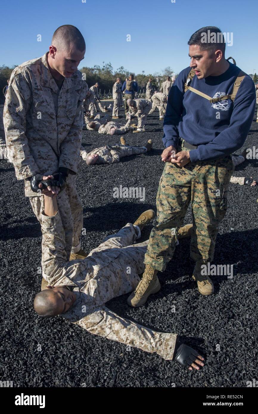 Recruits with Lima Company, 3rd Recruit Training Battalion, execute a ...