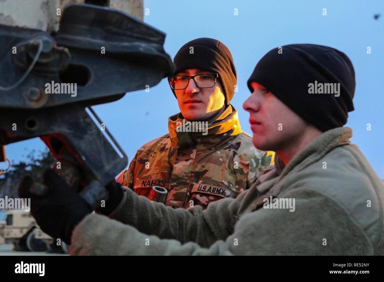 U.S. Army Sgt. Bryan Nahas and Spc. Austin Tilley, motor transport ...