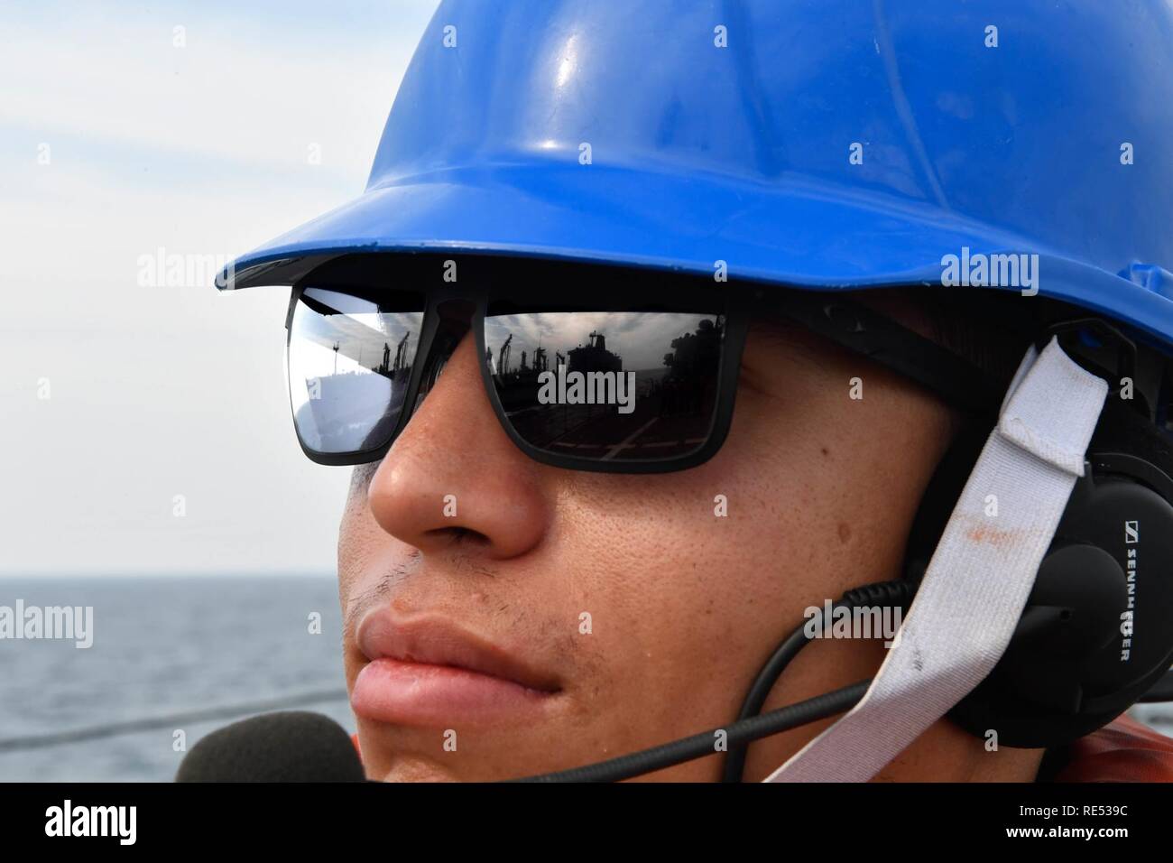 ARABIAN GULF (Jan. 3, 2019) Yeoman 2nd Class Randy Feliciano watches as ...