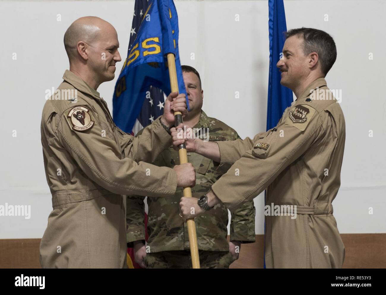 Col. Scott Gibson, 407th Air Expeditionary Group commander, receives ...