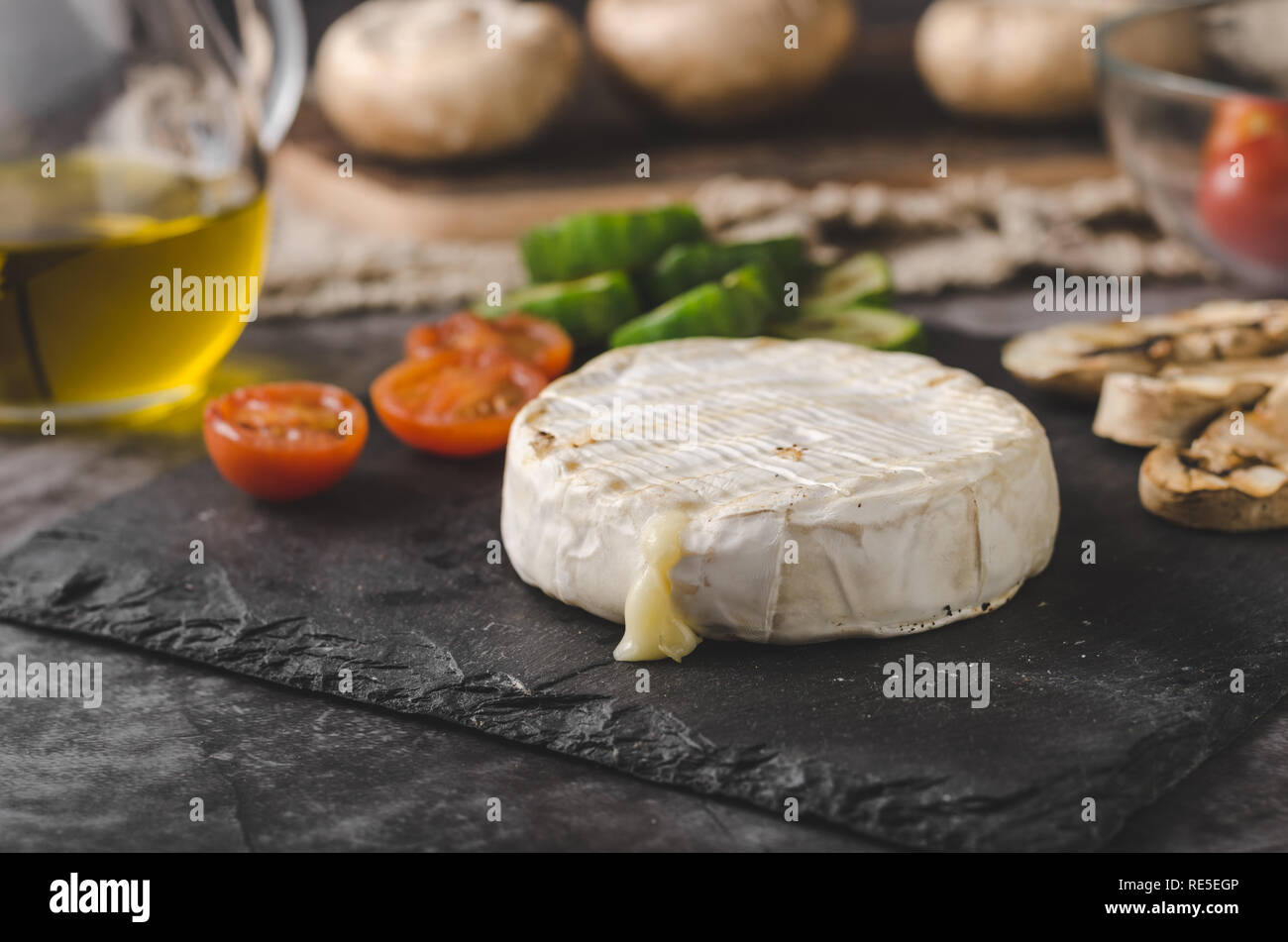 Grilled cheese with vegetable, olive oil, garlic and herbs Stock Photo ...