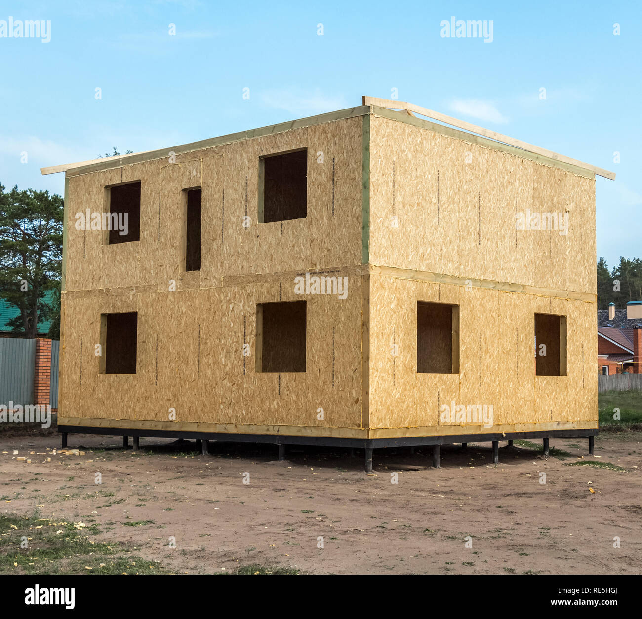 Construction of a wooden house of SIP panels Stock Photo - Alamy