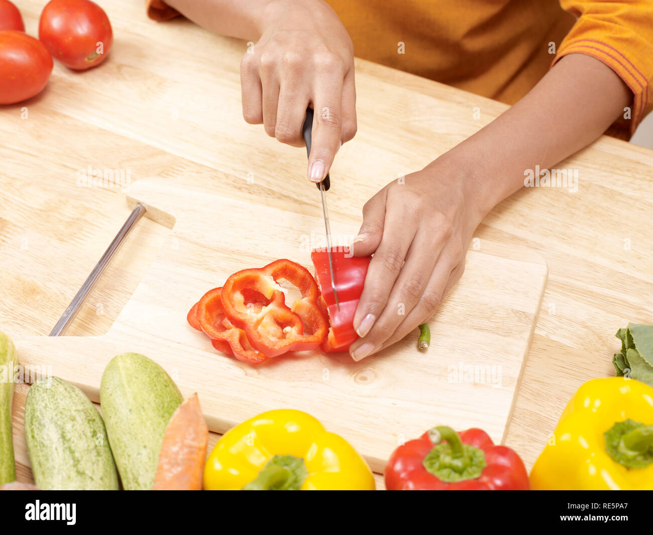 housewife cutting vegetables in kitchen Stock Photo - Alamy