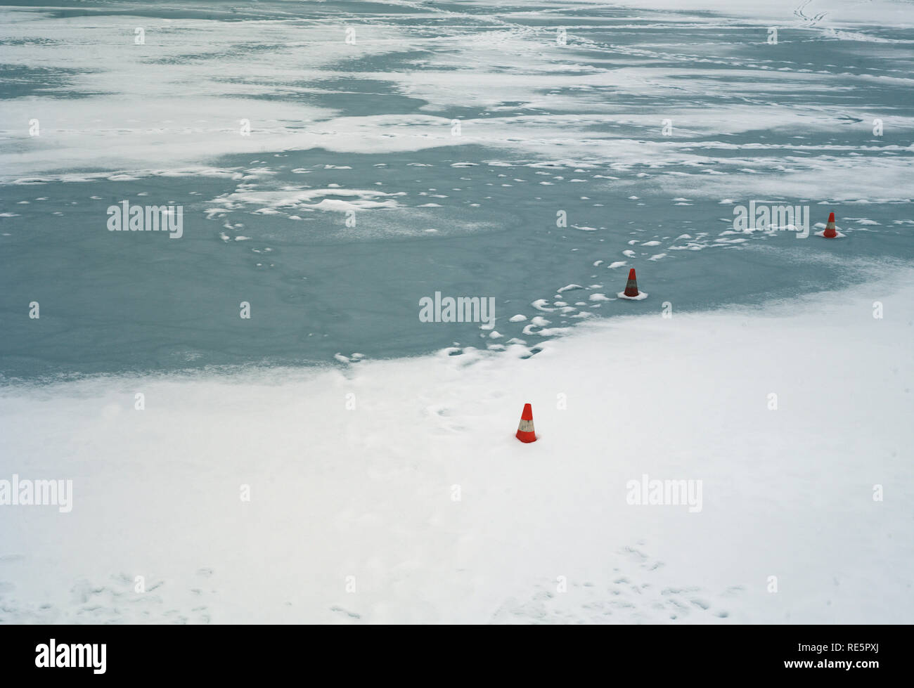 Warning sign of the surface of frozen lake or river, concept of danger ...
