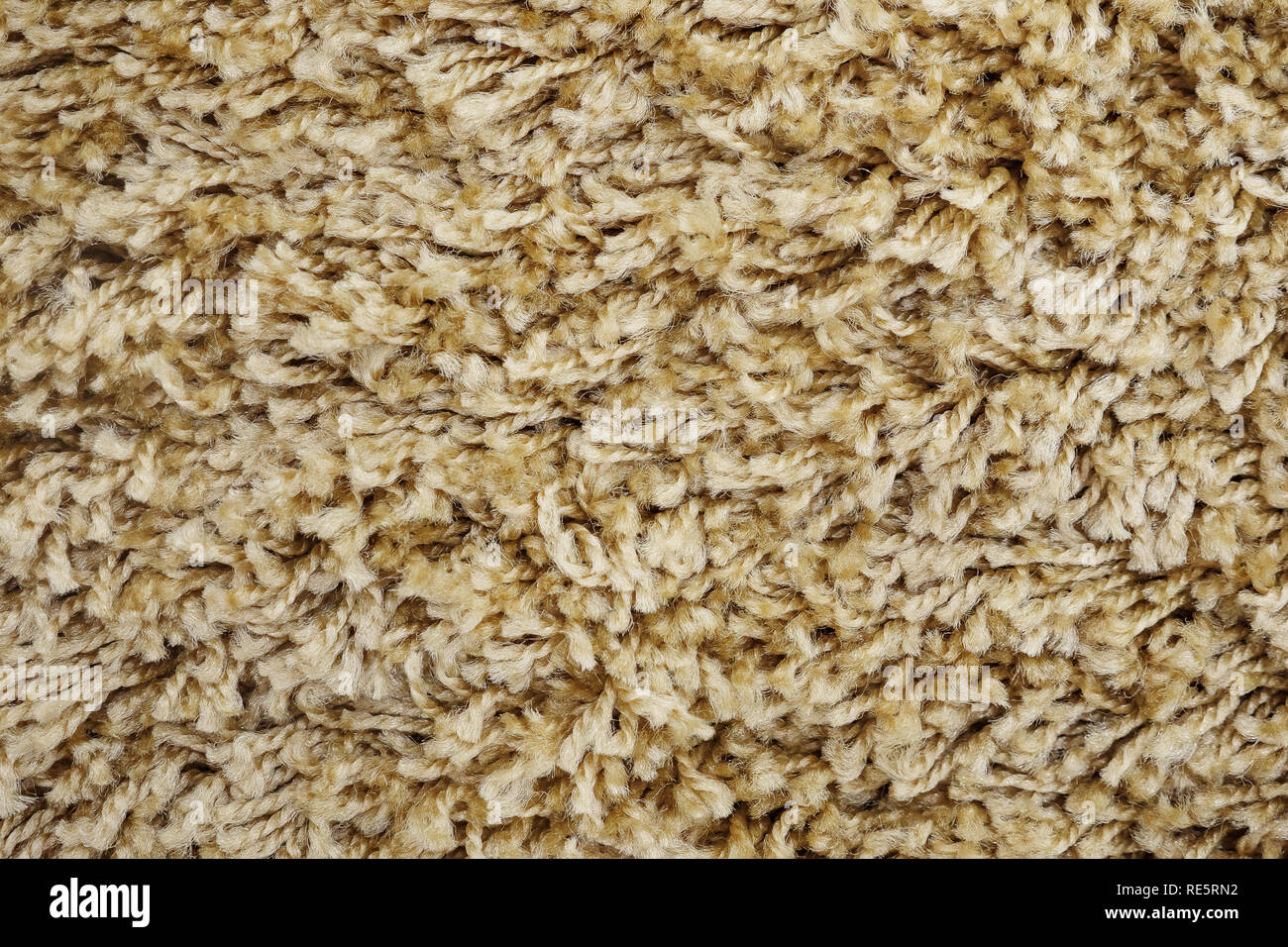 Close up of beige domestic carpet texture Stock Photo - Alamy