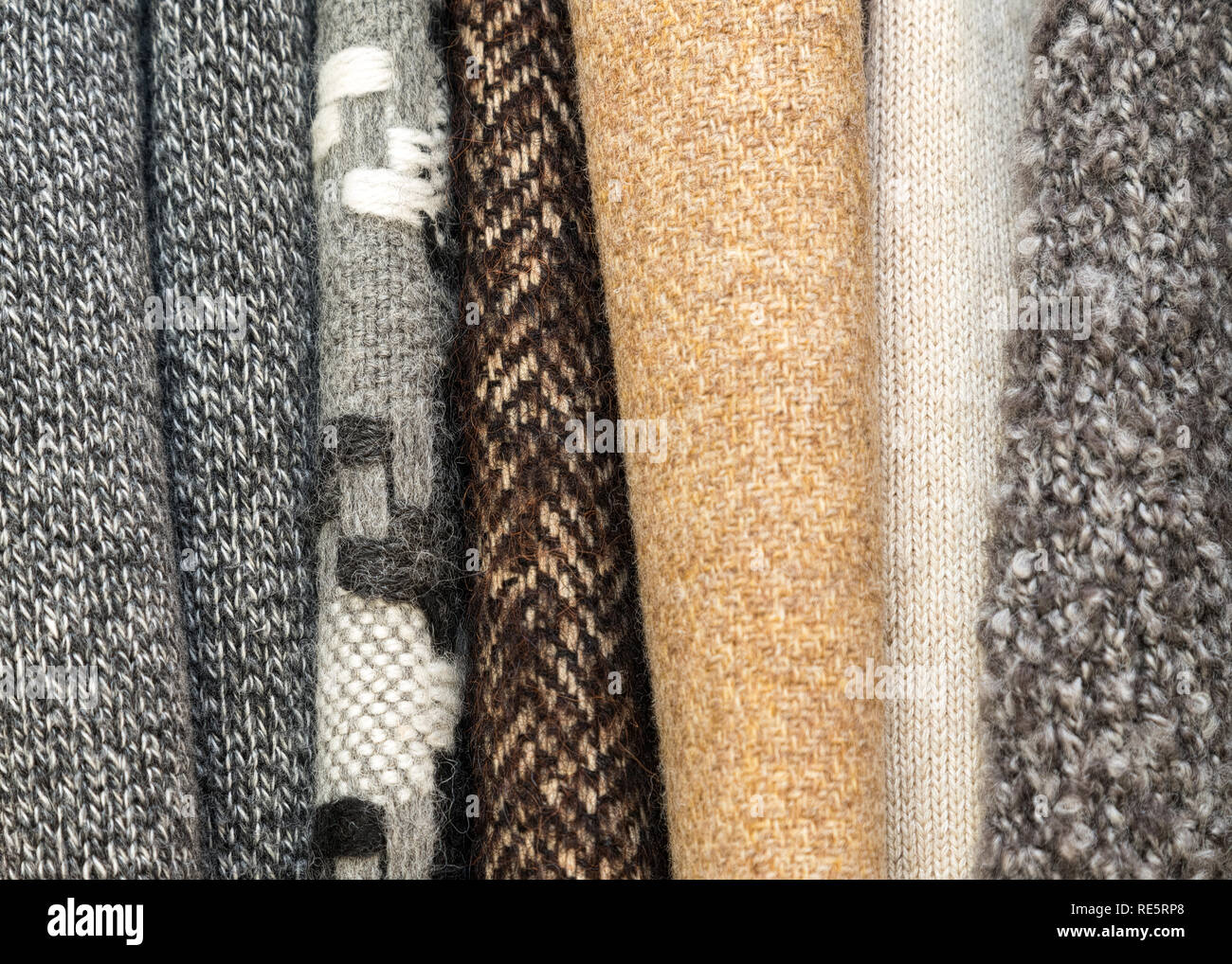 Different clothing textures of fine cloth at a tailor shop. Colorful ...