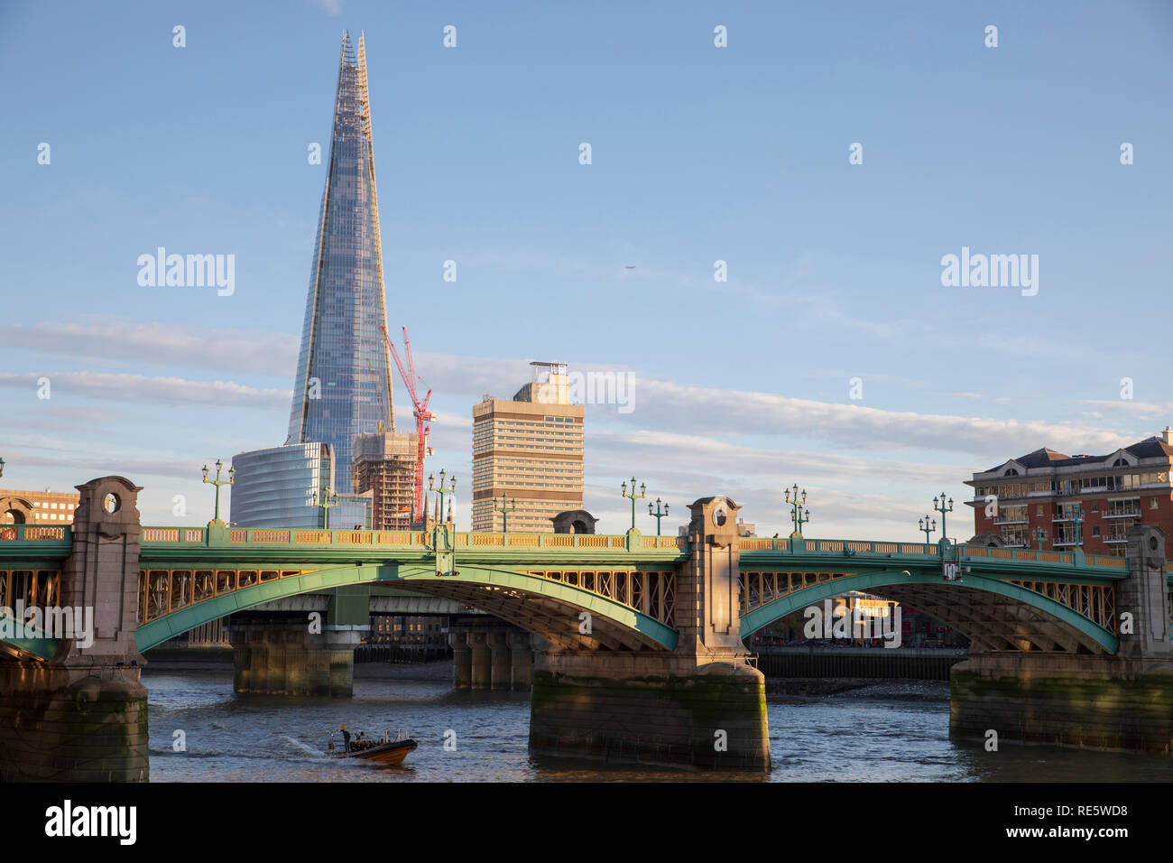 Southwark Bridge in London, England, with the Shard in the background ...