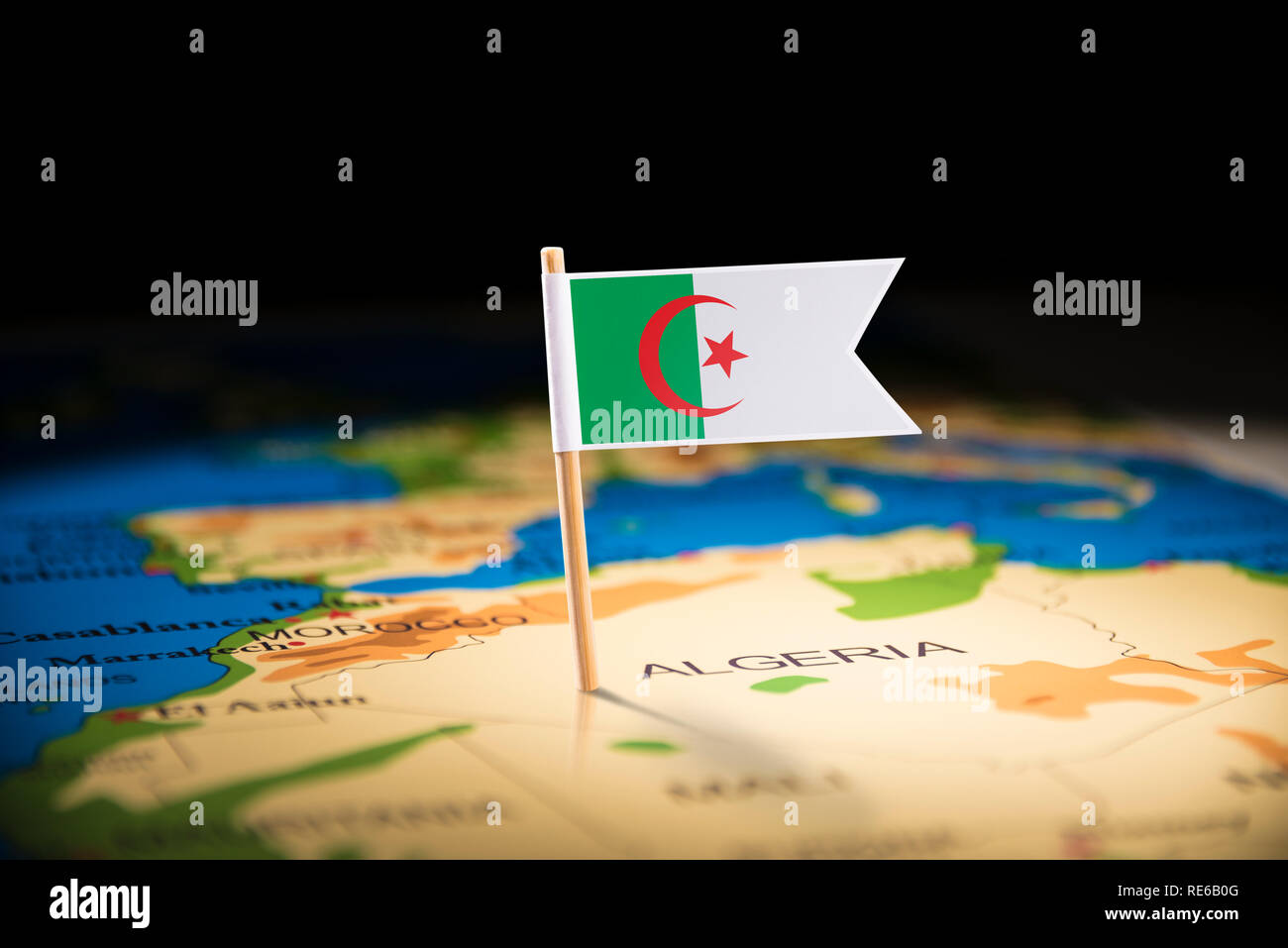Algeria marked with a flag on the map Stock Photo - Alamy