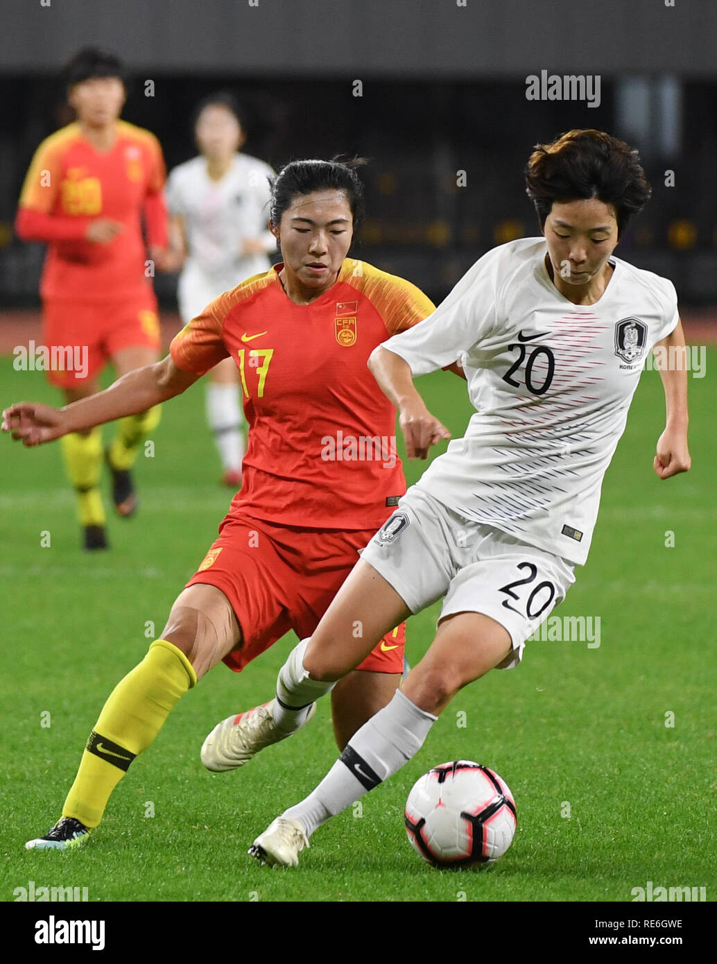 Wuhua, China. 20th Jan, 2019. Gu Yasha (L) of China vies with Kim Hye ...