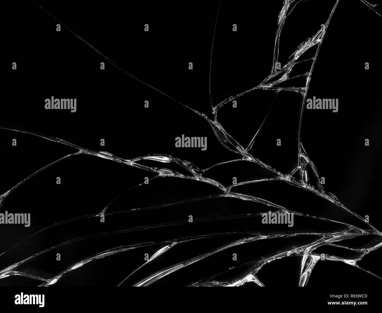 Cracked glass texture on black background. Isolated realistic cracked ...